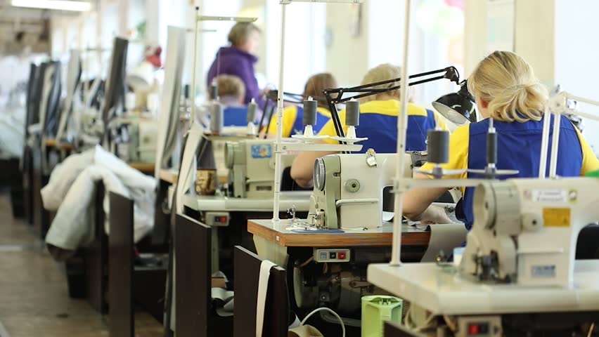 Woman Working at a Sewing Stock Footage Video (100% Royalty-free ...