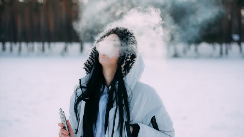 Pretty Young Girl Vaping Outside Stock Footage Video (100% Royalty-free ...