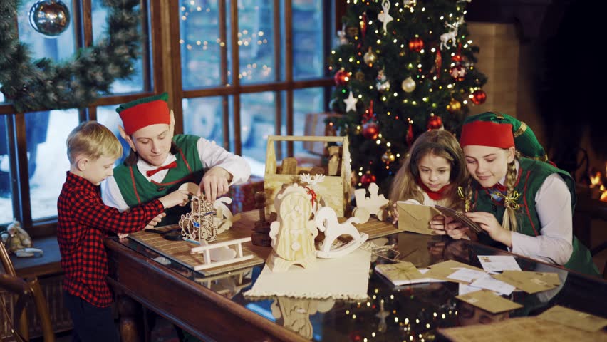 Christmas Elf Sitting on Presents image - Free stock photo - Public ...