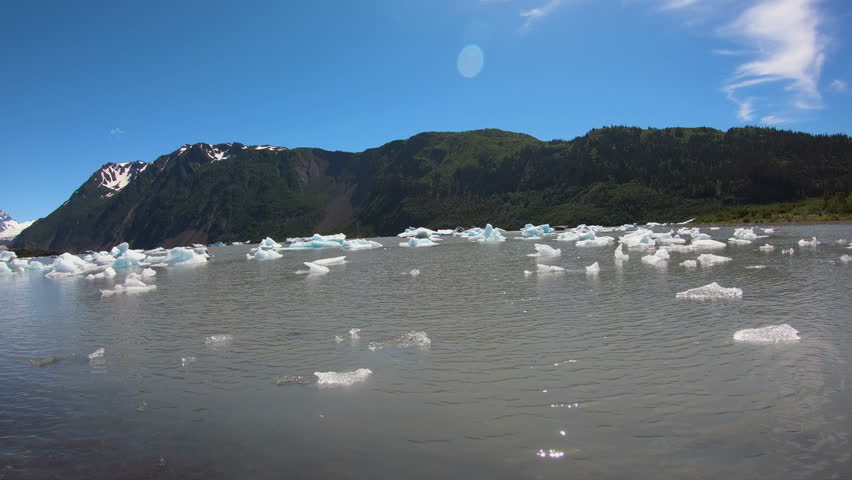 Landscape with snow-capped mountains with ice and water in Alaska image ...