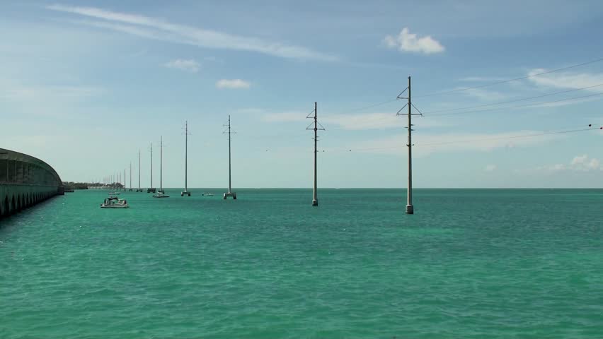 Stock video of power lines over water in the | 10429049 | Shutterstock