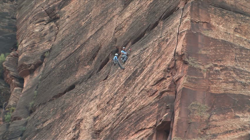Rock Climber Repelling Down a Stock Footage Video (100% Royalty-free ...