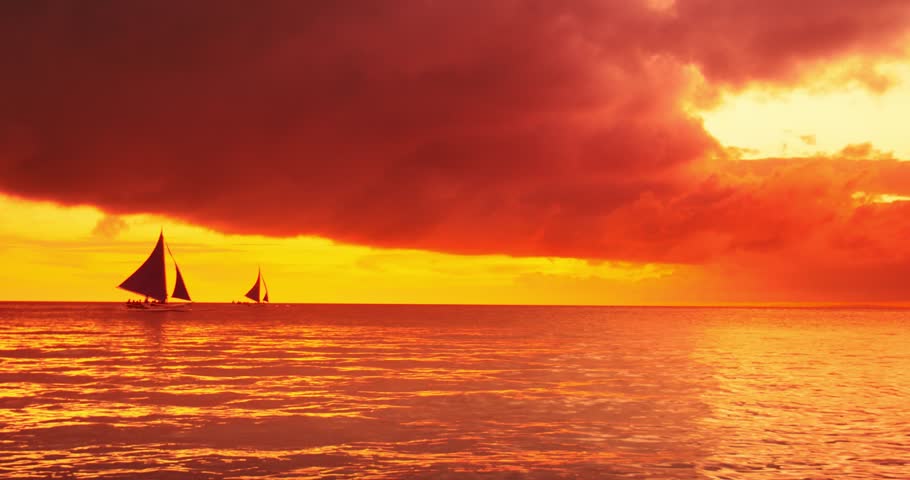 Amazing Colors Of Tropical Sunset. Sail Boats Silhouettes Floating On ...