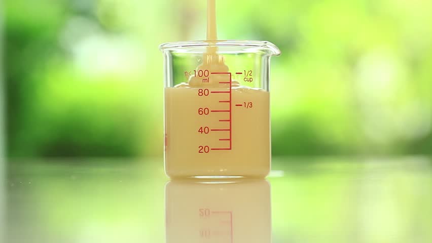 Condensed Milk Pouring Into a Stock Footage Video (100% Royalty-free ...