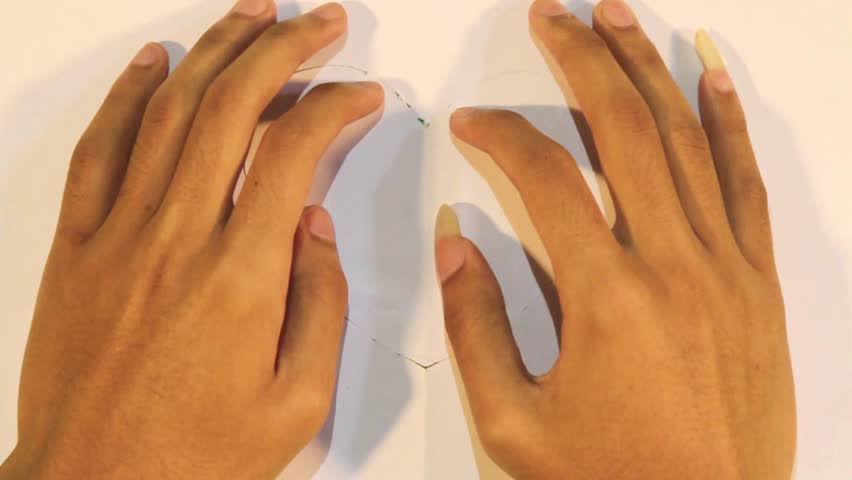 Vidéo de stock de attractive hand gesture opening paper into | 11654159 ...
