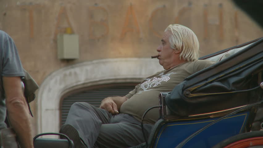 Man Chewing Cigar Outside Tabacchi. Stock Footage Video (100% Royalty ...