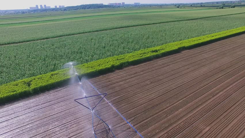 Tractor Moves Watering System Across Stock Footage Video (100% Royalty ...