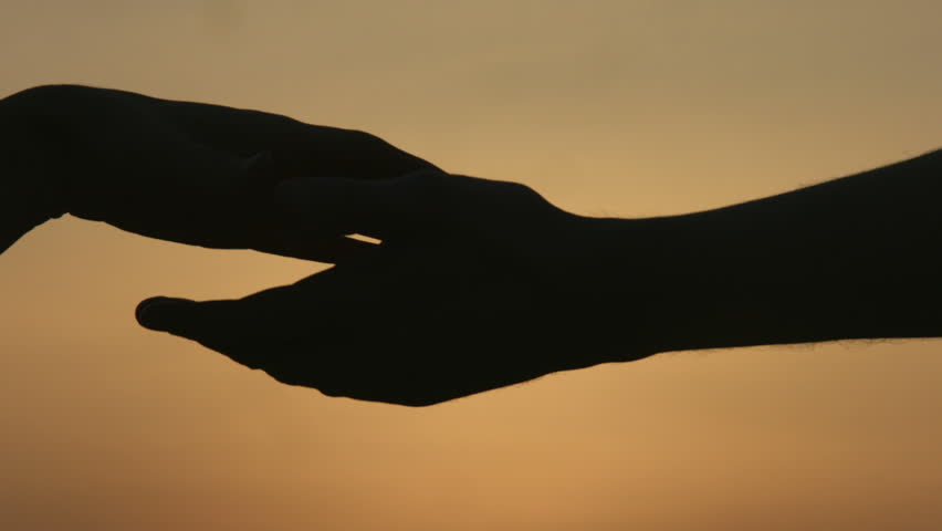 Stock video of man lending hand to woman at | 13203689 | Shutterstock