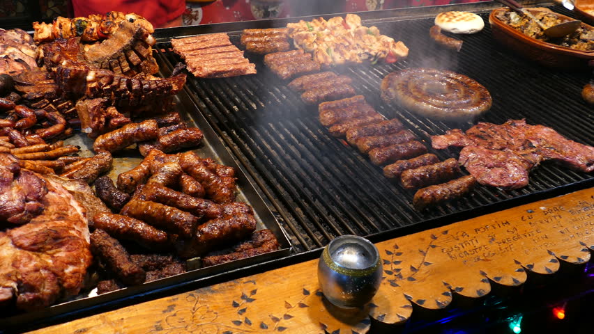 Romanian Sausages (mici) And Pork Prepared On The Grill. 4K. Stock ...