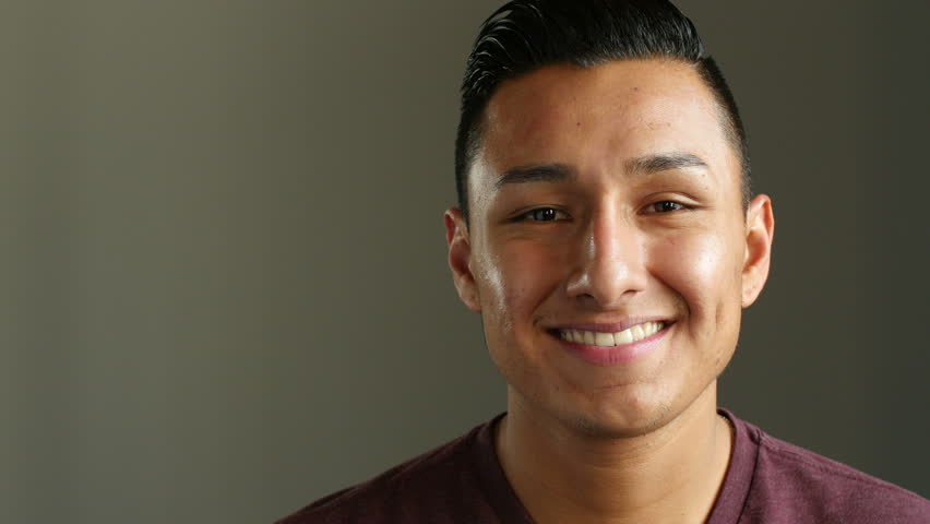 Close Up Portrait Of A Young Hispanic Man, Smiling Stock Footage Video ...