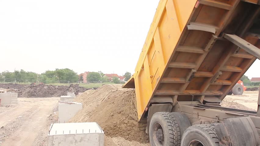 Stock video of dump truck is unloading soil. dumper truck | 14311639 ...