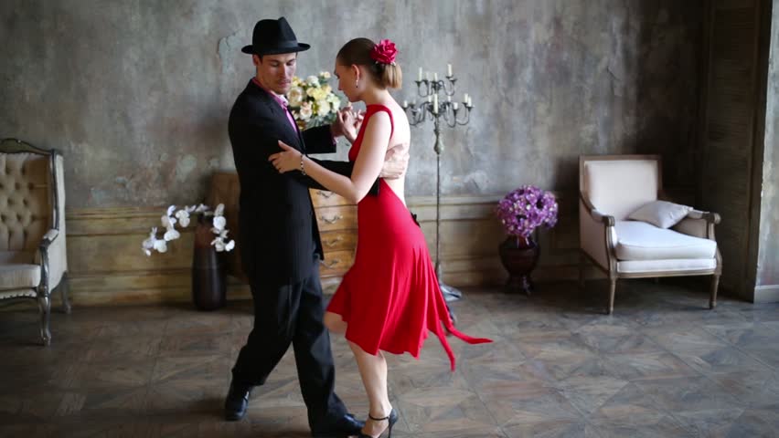 Couple Dancing Tango With Rose In Teeth In Retro Room Stock Footage ...