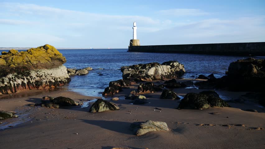 Lighthouse and Wave at Aberdeen Stock Footage Video (100% Royalty-free ...
