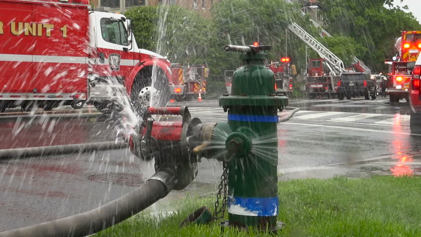 WASHINGTON, DC - MAY 2016: : Leaking Fire Hydrant Sprays Water ...