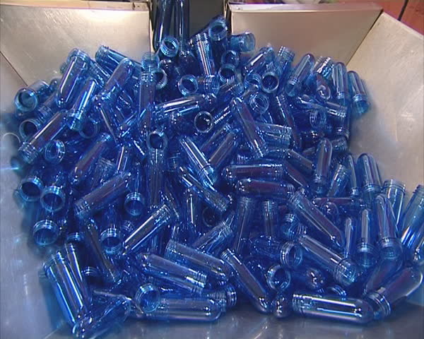 Stock Video Clip of Blue plastic forms for PET bottle production ...