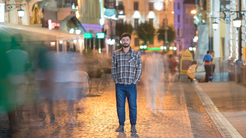 Crowd Moving Fast Near Man Standing Still Stock Footage Video 9045241 ...