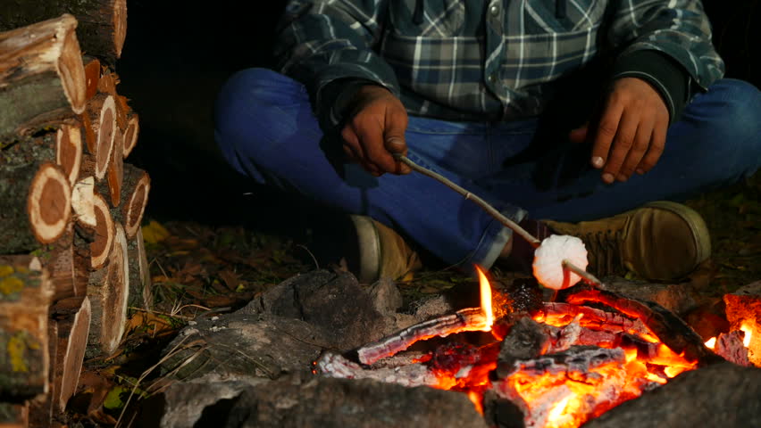 4k . Man Roasting Marshmallows Stock Footage Video (100% Royalty-free ...