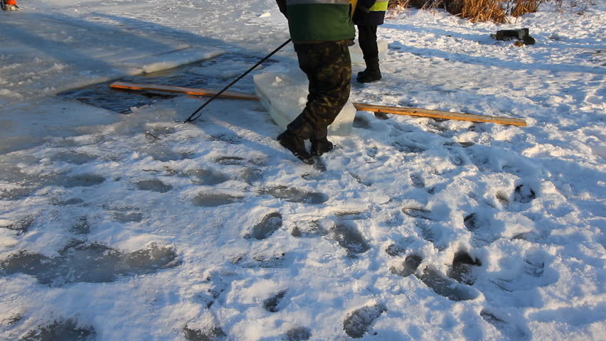 In This Video, We Can See That A Man Is Throwing A Spade Of Snow Onto A ...