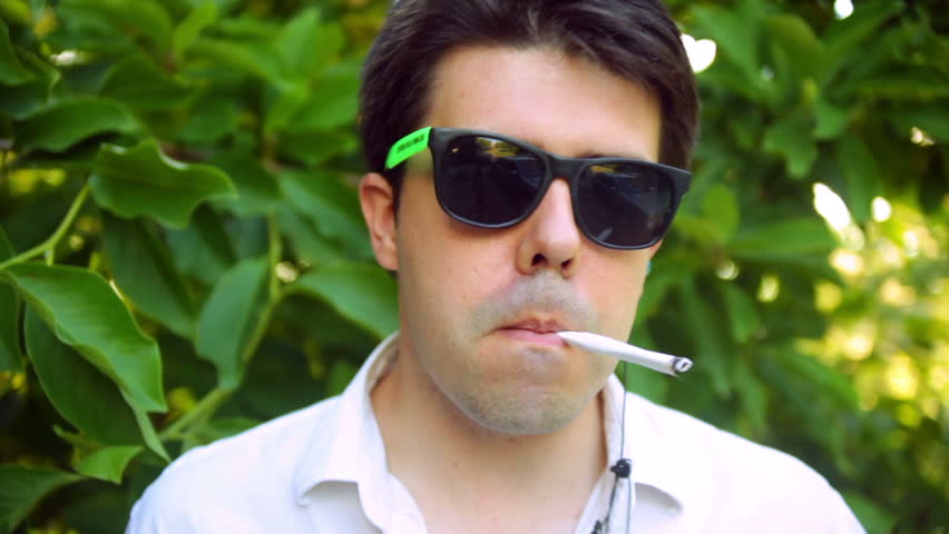 Hipsterish 80s Guy Smoking Something Stock Footage Video (100% Royalty ...