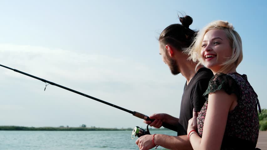 Happy Couple Fishing On Spinning Together At Sunbeam, Lovely Couple ...