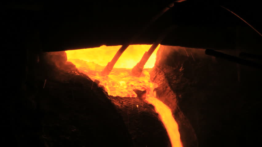 Hot Metal Pout Out From Blast Furnace. Liquid Metal Pouring From Blast ...