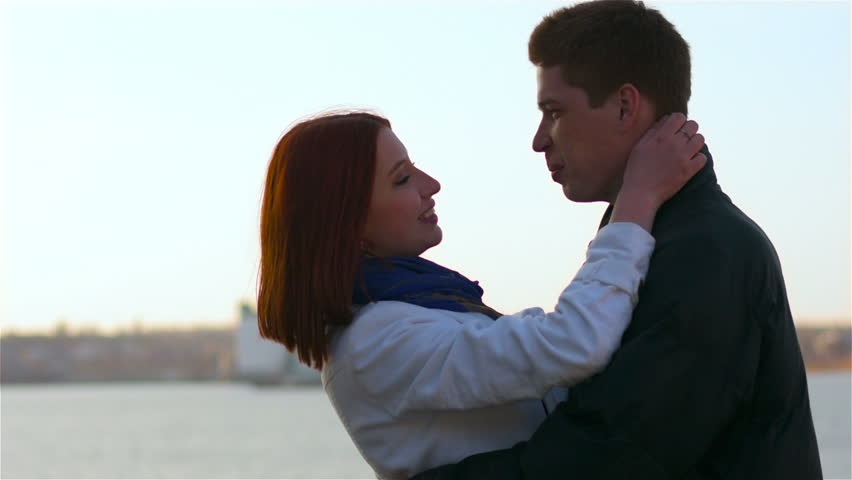 Girl Gives Tender Kiss To Her Lovely Boyfriend, Romantic Young Couple In Sunbeam, Sensitivity Of ...