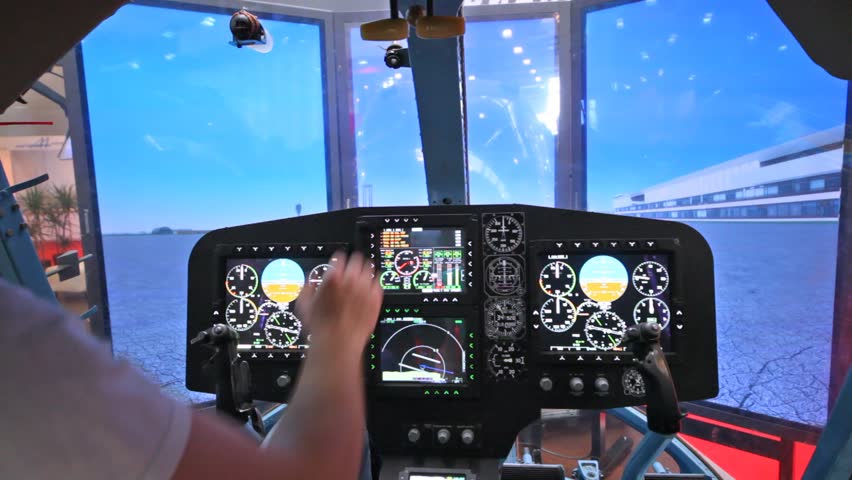 Pilot Operates Helicopter Simulator During Simulated Flight On ...