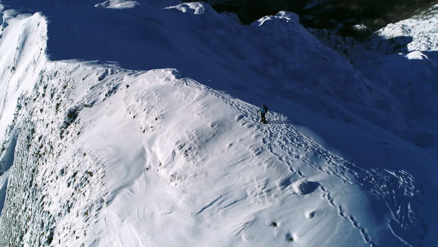 White Snow Rocky Mountain Cliff. A View Of A Sheer Rock Cliff Covered ...