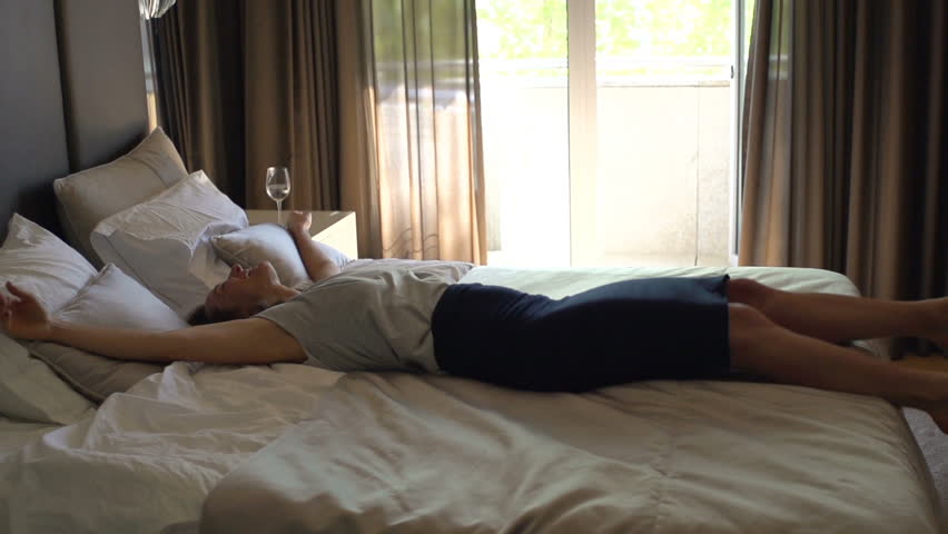 Happy Woman Falling On Bed Stock Footage Video (100% Royalty-free ...