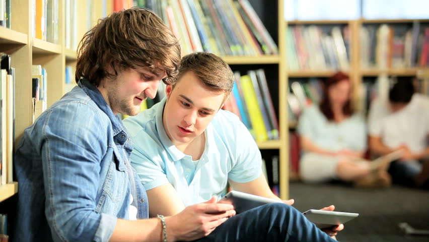 Teacher Passing Out Books In Library In High Quality 4k Format Stock ...