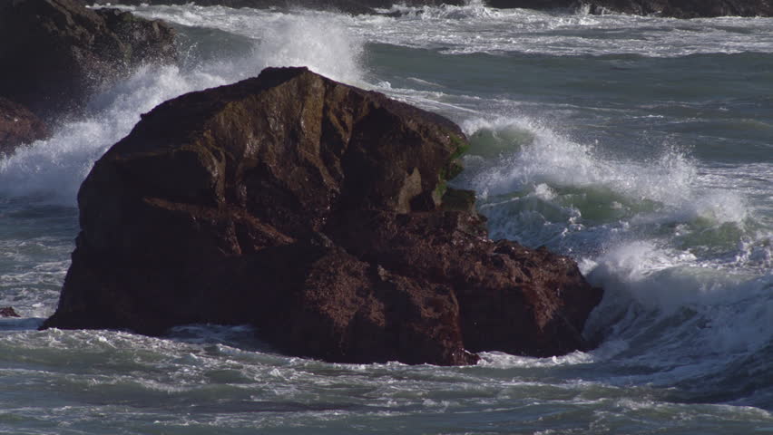 Huge Waves Crash Against A Cliff Outside Of Santa Cruz, California ...