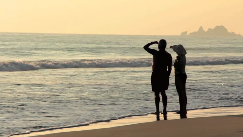 Stock Video Clip of Senior couple looking into the horizon | Shutterstock