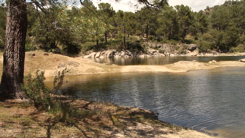 Heavy River Rapids Flow Down Canyon Into Slower Moving Stream Stockowy ...
