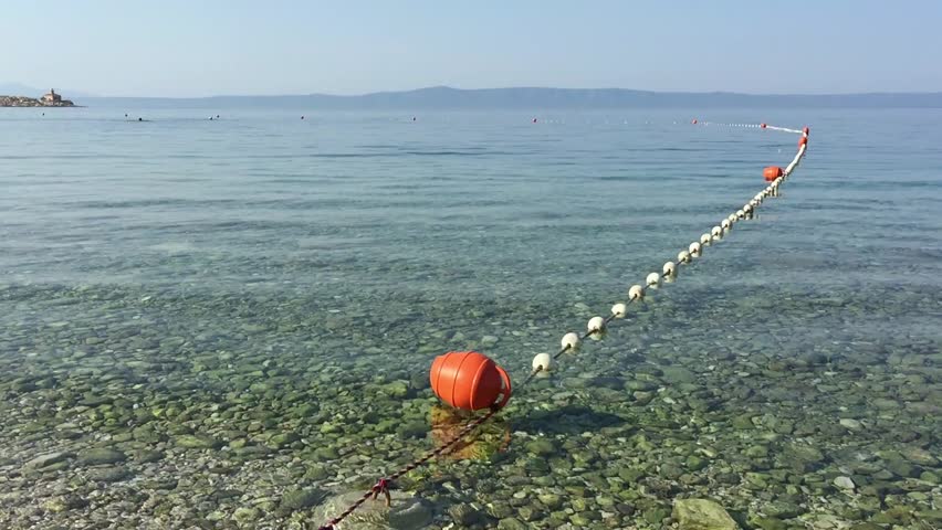 Buoys Define Boundaries For Safe Swimming. The Yellow Buoys Swing On ...