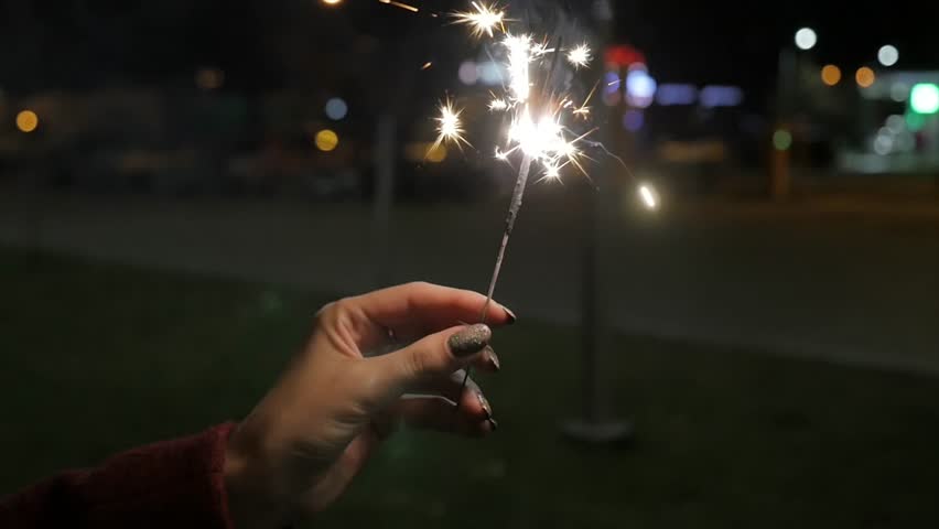 4k.Male Hand Lights Fireworks . Dark Background วิดีโอสต็อก 34803376 ...
