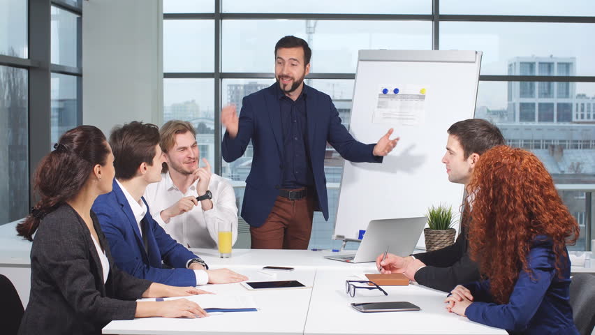 Business Team Watching Manager Make Presentation In The Office Stock ...
