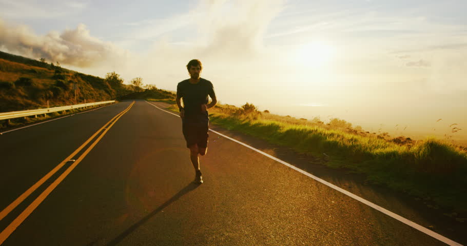 Young Man Running Outdoors In The Evening Full HD Videos de metraje en ...