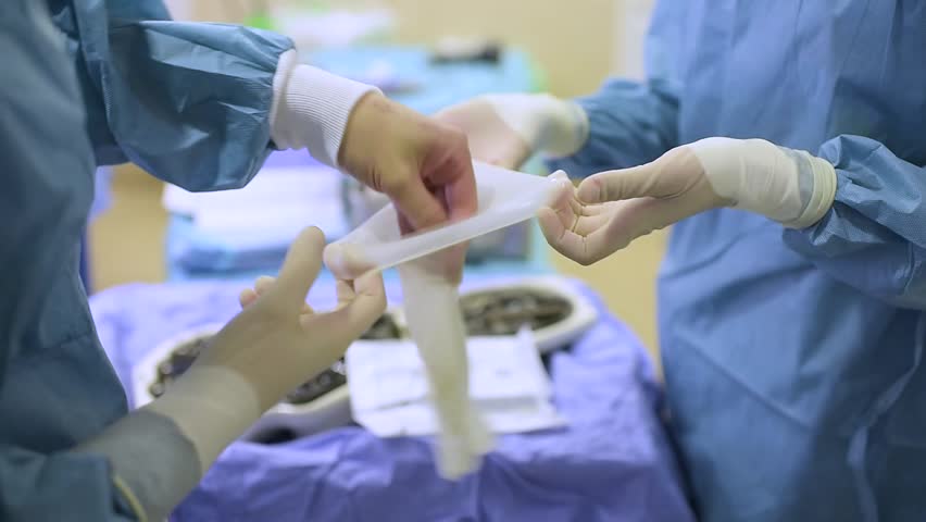 Surgeons Doing a Surgery Stock Footage Video (100% Royalty-free ...