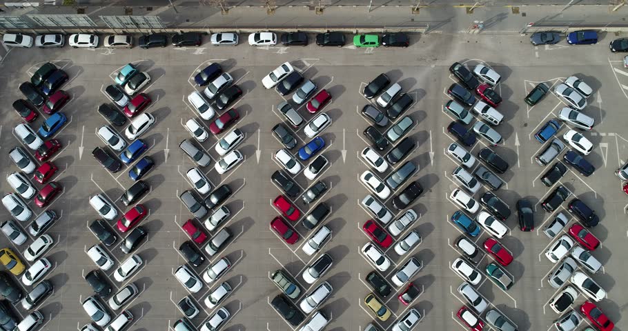 Aerial Top Down View Flying Sideways Over New Car Storage Parking Lot ...