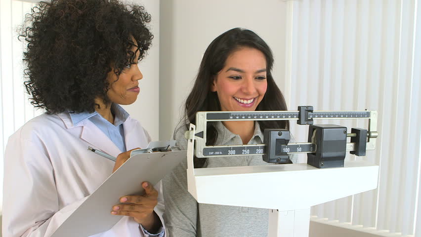 Young Female Hispanic Patient Checks Stock Footage Video (100% Royalty ...