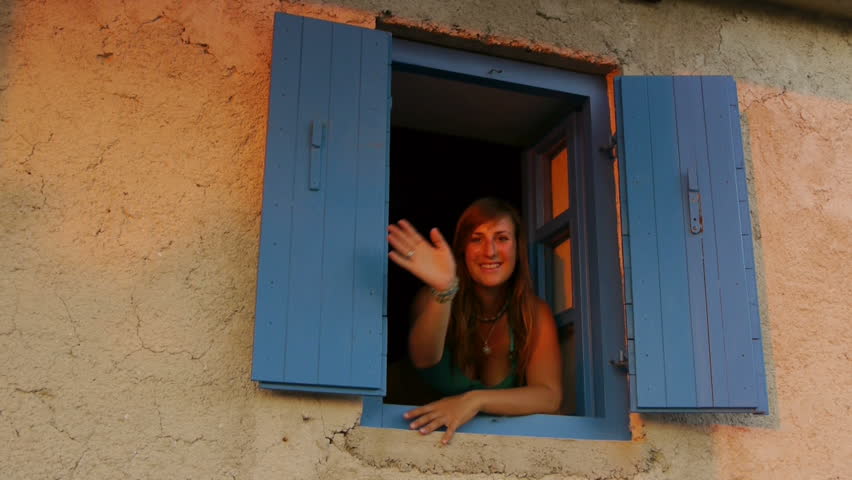 Stock video of young woman waving out the window | 3584609 | Shutterstock
