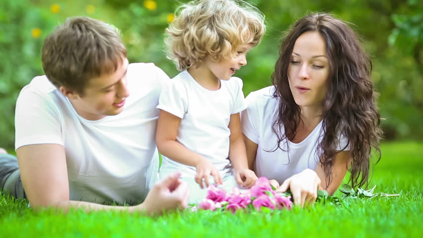 Happy Family Having Fun Outdoors In Spring Park Stock Footage Video ...