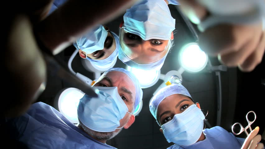 Upper Body Hospital Surgical Team Dressed Scrubs In Operating Room Shot ...
