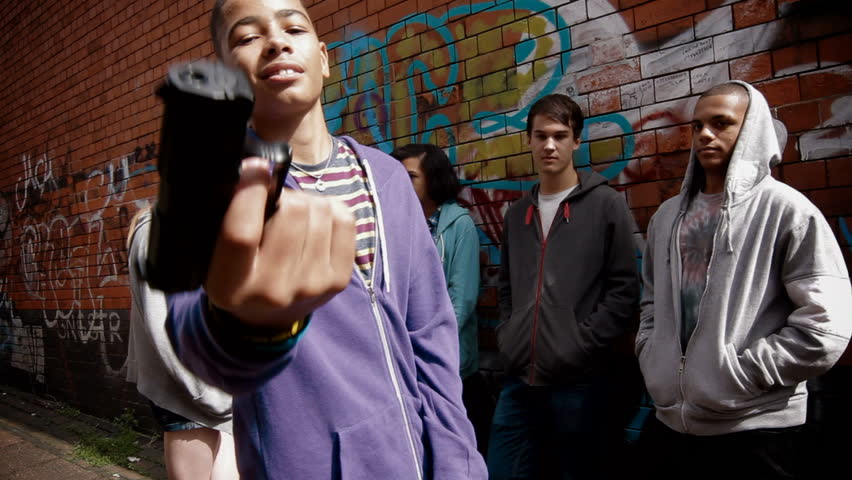 Gang Intimidation - Gang Members Pressure A Younger Boy To Take A Gun ...