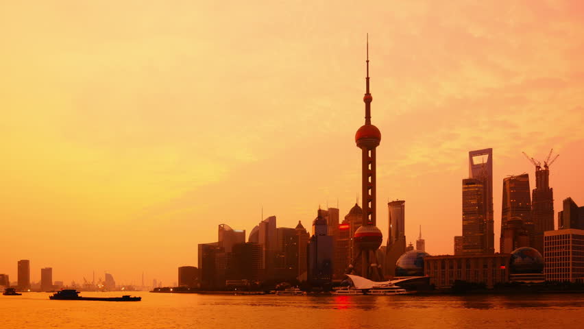 China - January 2012: Warm Tone View Of Sunrise Behind Modern Shanghai ...