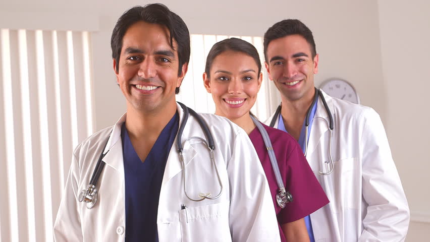 Happy Hispanic Doctors Standing In Office Stock Footage Video 4286627 ...