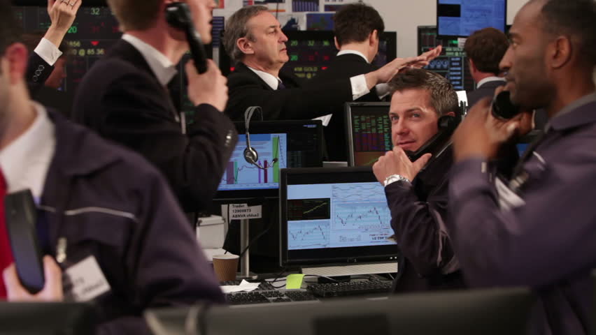 Young And Ambitious Stock Market Trader Is Doing A Deal Over The Phone ...