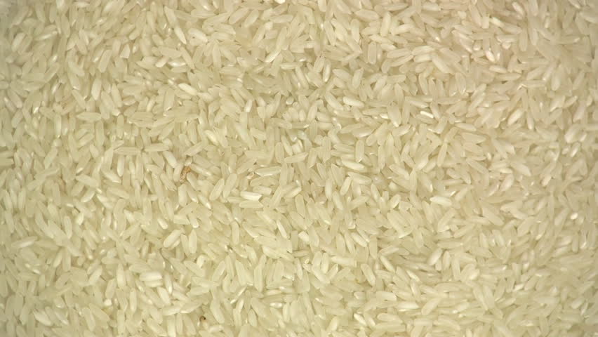 Rotating Dry Uncooked Rice. Spinning Closeup Seeds. 1920x1080. Full Hd ...