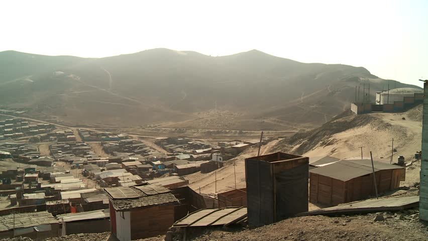Huts Of A Slum In The Desert Near Lima, Peru. Sun In The Background ...