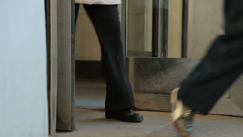 People Walking Through Entrance Doors Stock Footage Video (100% Royalty ...